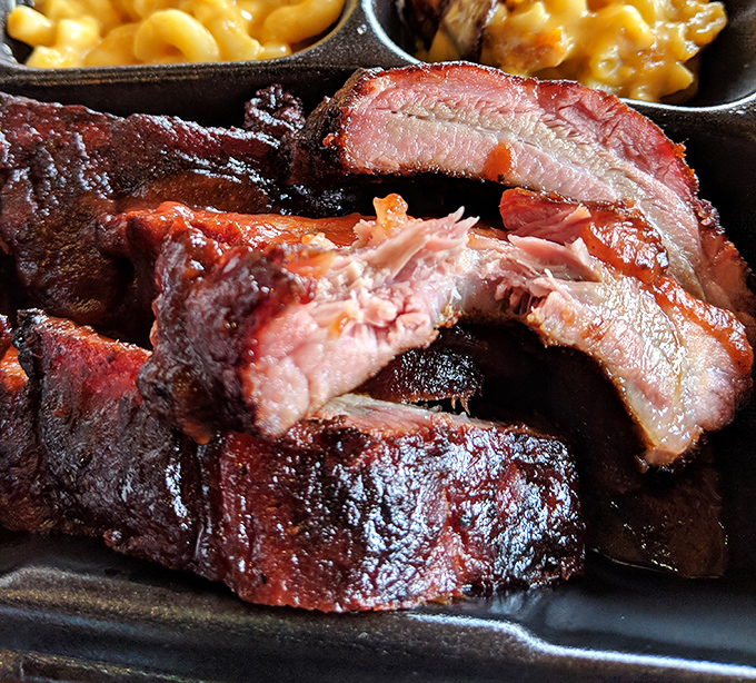 Brisket with that telltale pink smoke ring&mdash;nature's way of confirming you've made an excellent life choice today.