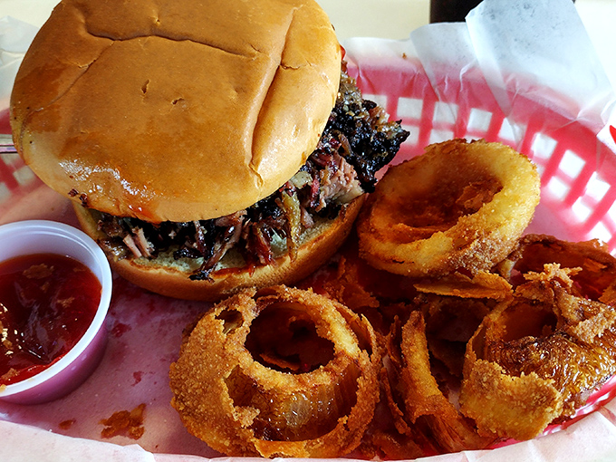 This brisket sandwich doesn't need fancy presentation&mdash;it's too busy being the reason stretchy pants were invented. Those onion rings aren't shy either.