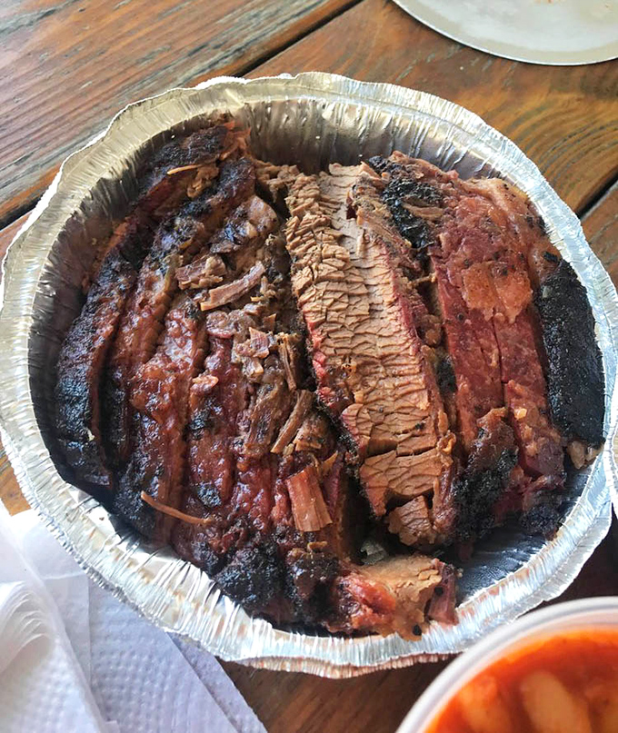 This brisket has the telltale pink smoke ring that separates the masters from the amateurs&mdash;a testament to hours of low, slow, smoky dedication.