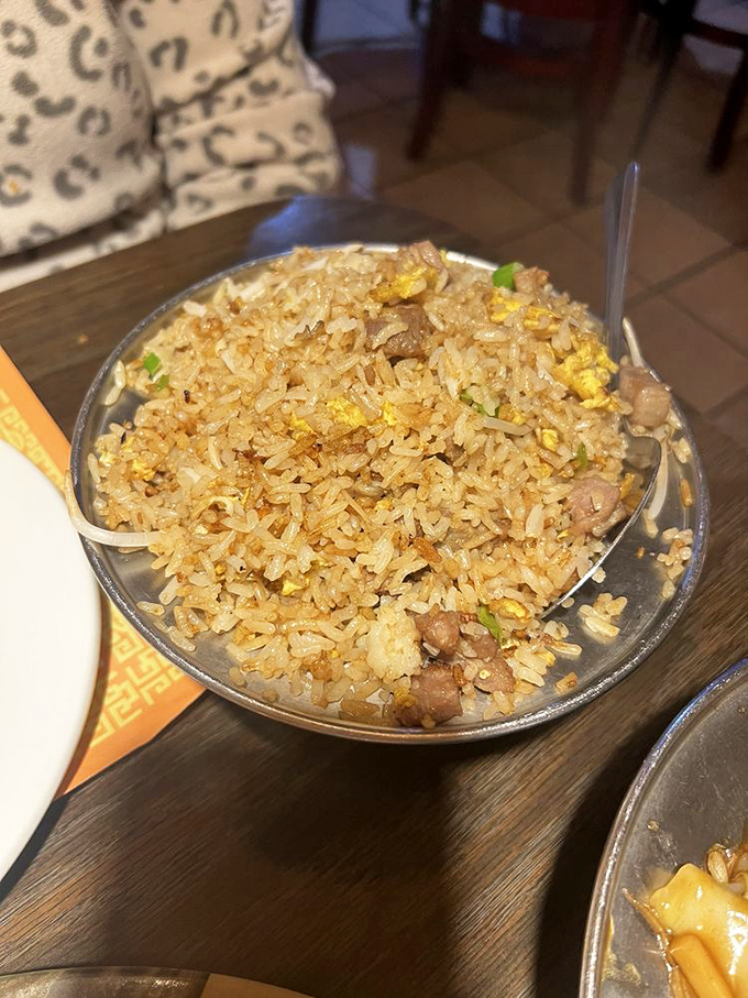 Not your sad takeout fried rice. Each grain stands distinct, seasoned throughout, with those coveted crispy bits that rice aficionados treasure.