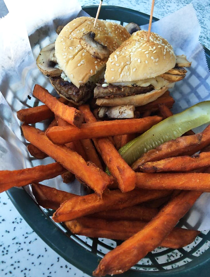 Sweet potato fries escort this burger like backup singers &ndash; crispy, golden, and stealing every scene they're in.