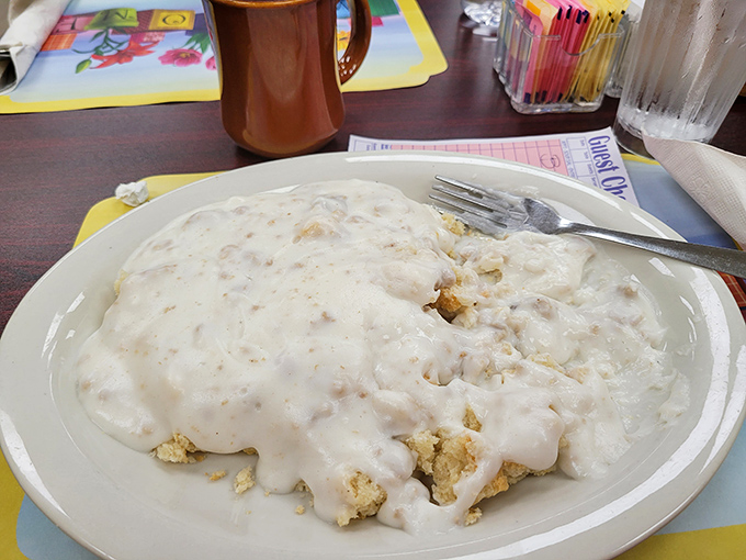 Biscuits and gravy so comforting it could end international conflicts&mdash;a creamy, peppery blanket covering tender islands of dough.