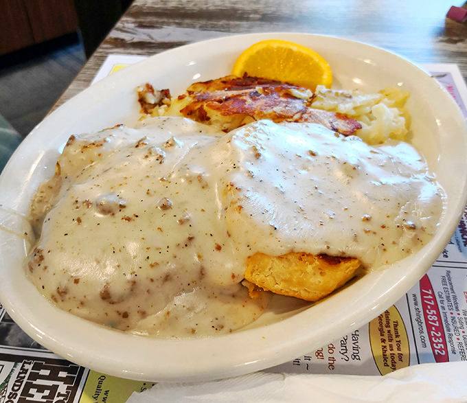 Biscuits smothered in sausage gravy &ndash; the kind of breakfast that makes you want to take a nap immediately after finishing it.