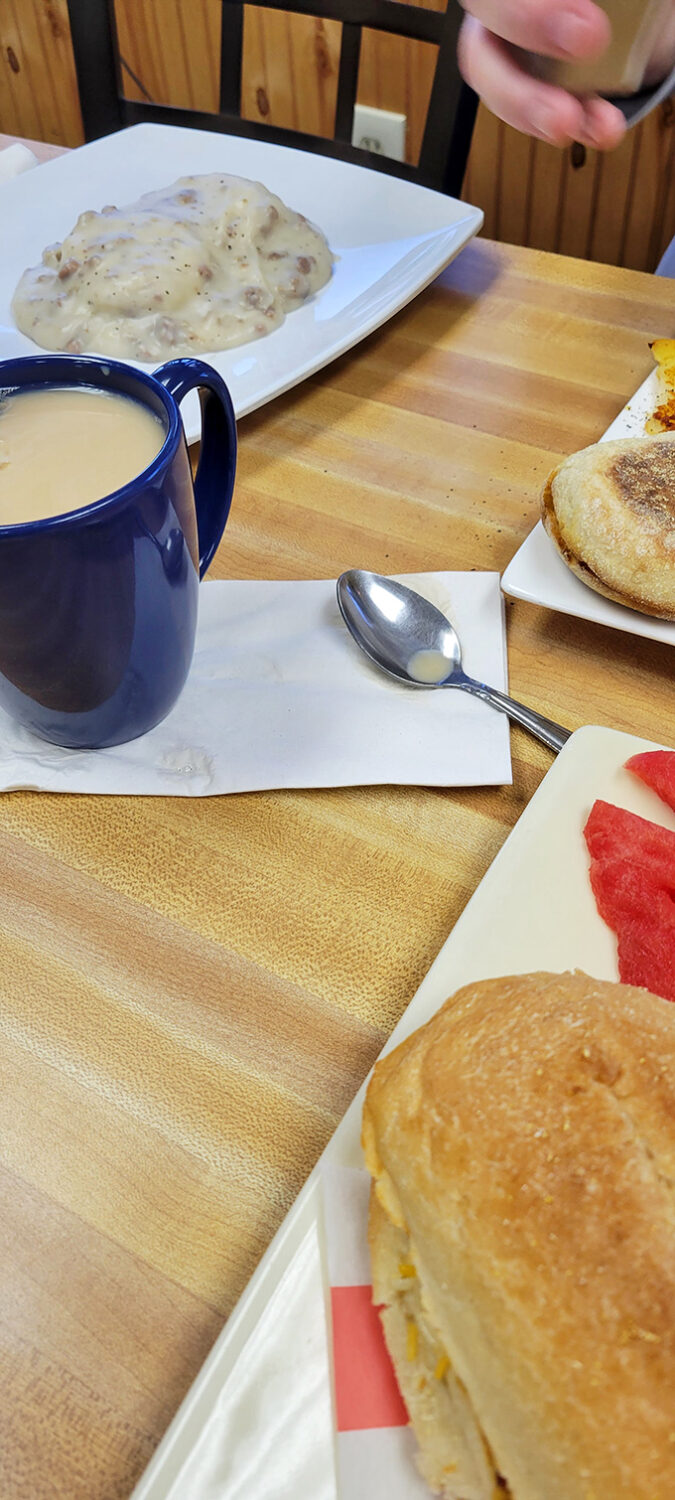 Coffee and biscuits with gravy - the holy trinity of Southern breakfast comfort served with genuine hospitality.