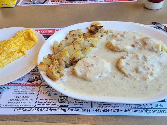 Biscuits and gravy: the South's greatest contribution to breakfast, served Delaware-style. That pepper-speckled cream gravy is practically drinkable.
