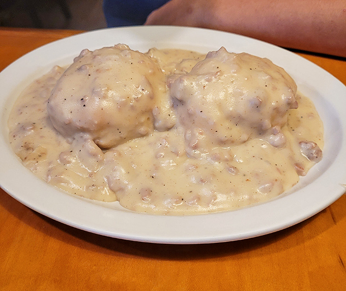 Biscuits and gravy&mdash;the breakfast of champions who plan on napping by noon. Creamy, peppery gravy blankets these fluffy islands of comfort.