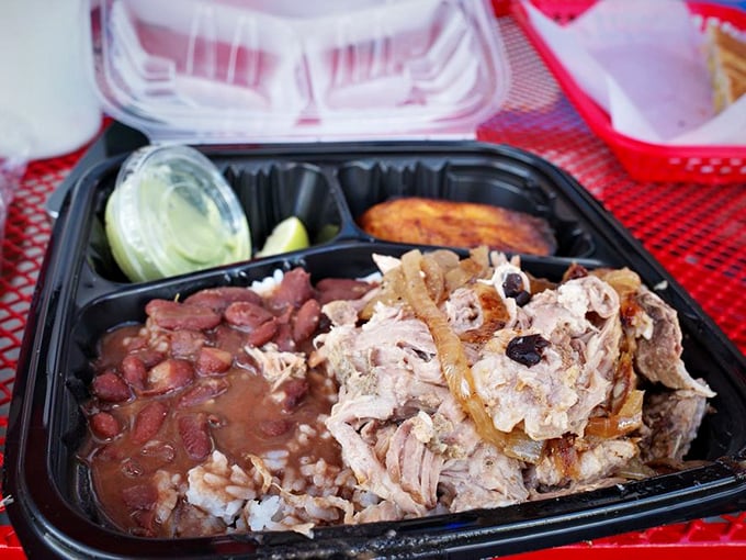 This Cuban bowl is the comfort food equivalent of a warm hug. Black beans, rice, and slow-roasted pork creating harmony in a humble takeout container.