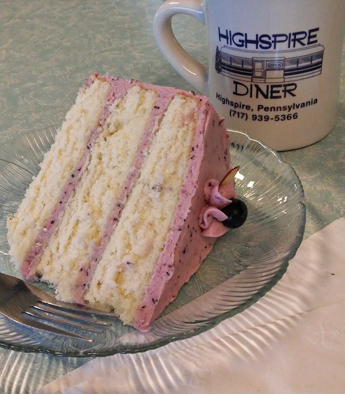 Layer cake that makes birthday candles unnecessary. Each forkful of this blueberry masterpiece is like a standing ovation for your taste buds.