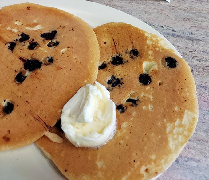 Blueberry pancakes with a dollop of butter &ndash; like fluffy clouds dotted with tiny bursts of fruity sunshine. Breakfast doesn't get more comforting.