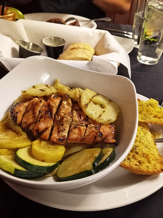 The Bourbon Chicken brings sweet and savory together in perfect harmony, surrounded by colorful grilled vegetables that almost—almost—steal the show.