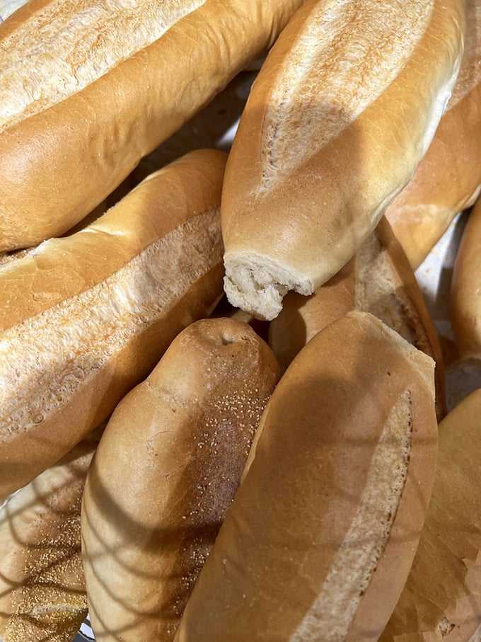These aren't just loaves – they're blank canvases for culinary masterpieces. Crusty on the outside, tender within, like all good Italians.