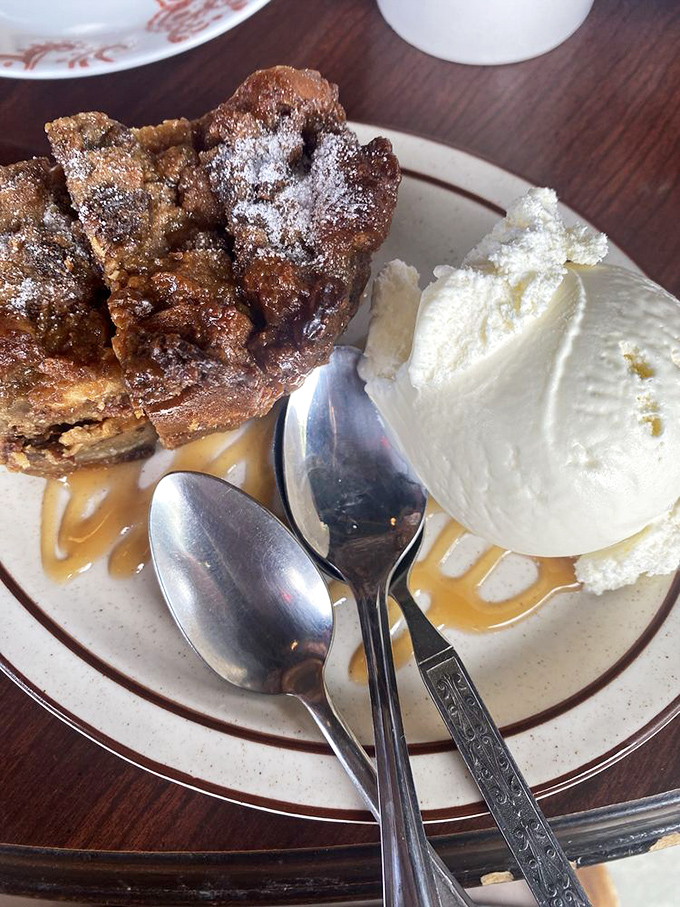 Bread pudding that's worth saving room for &ndash; swimming in caramel sauce with a scoop of vanilla ice cream melting alongside.
