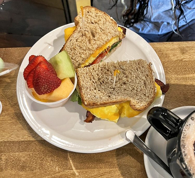 The breakfast sandwich&mdash;civilization's greatest achievement since indoor plumbing. Fresh fruit on the side keeps your conscience as clean as the plate will be.