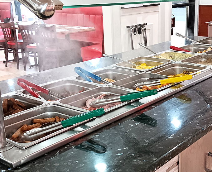 The breakfast buffet line &ndash; where dreams are made, diets are forgotten, and the day's first important decisions happen.