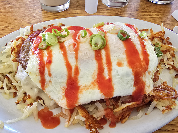 This isn't just breakfast wrapped in a tortilla &ndash; it's morning joy smothered in sauce with enough heft to fuel you through life's marathon.