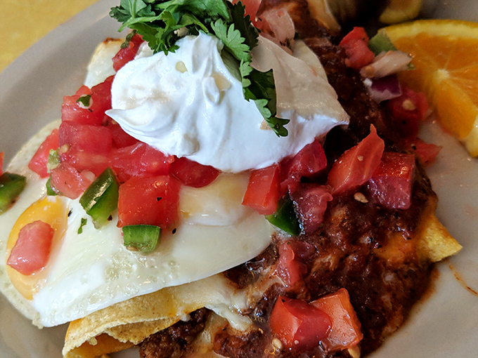 Breakfast enchiladas that answer the eternal question: "Why should dinner have all the fun?" Topped with an egg for good measure.