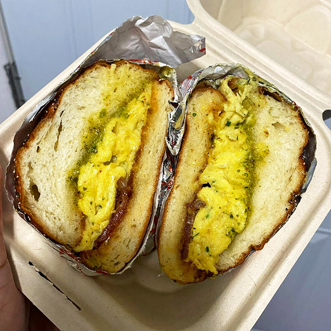 Breakfast sandwiches should always look this good&mdash;eggs and fillings peeking out like they know they're the stars of the morning show.