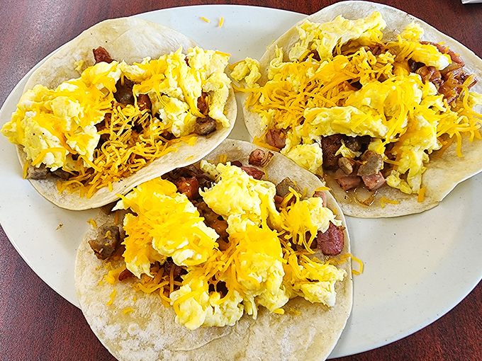 Breakfast tacos that prove good morning food knows no borders. A symphony of eggs, meat, and cheese that sings "rise and shine!"