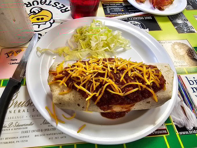 This breakfast burrito isn't messing around &ndash; packed with fillings and topped with enough cheese to make Wisconsin proud.