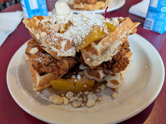 The chicken and waffle summit: where crispy meets fluffy and maple syrup plays delicious mediator.