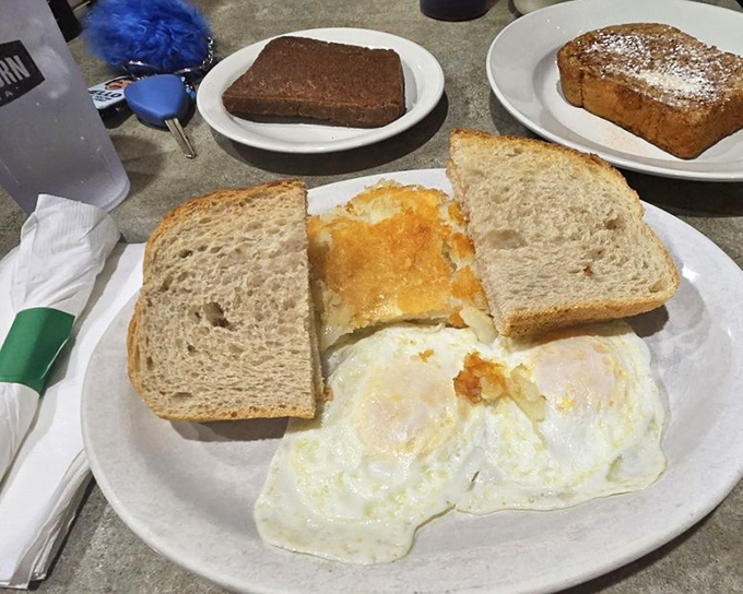 The classic American breakfast: where eggs, toast, and possibility meet. Simple perfection that makes fancy brunch spots seem unnecessarily complicated.