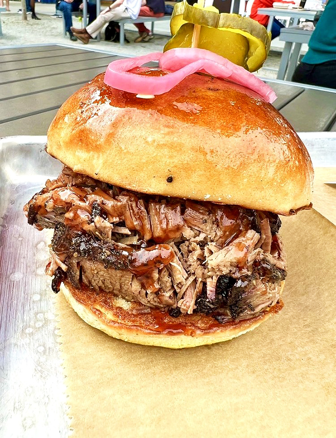 A pulled pork sandwich that requires what locals call "the BBQ lean"&mdash;that instinctive posture to keep the delicious evidence off your shirt. 