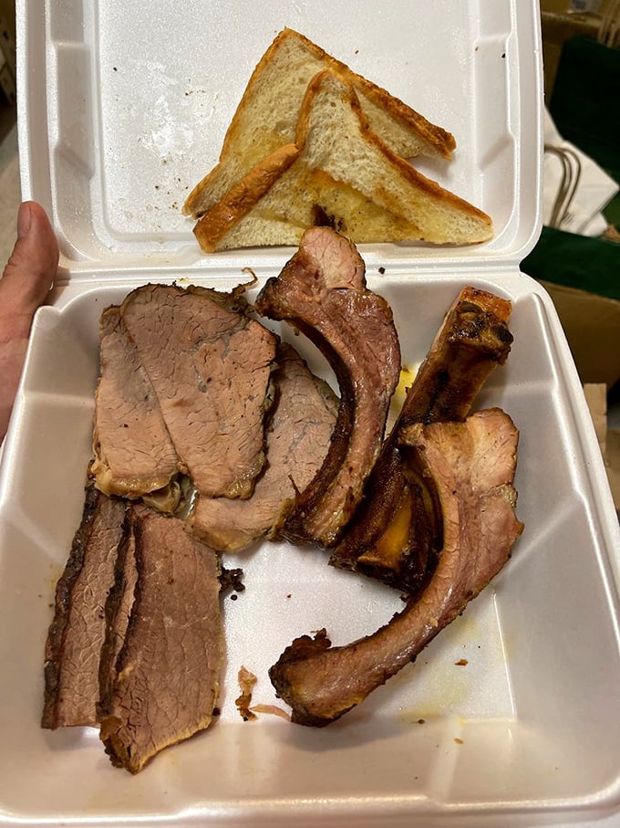When meat is this good, styrofoam containers become fine china. That smoke ring is the barbecue equivalent of a Michelin star.