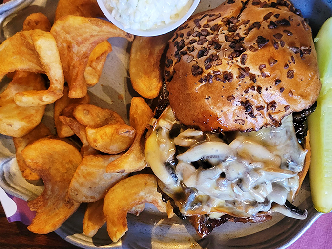 A burger that answers the eternal question: "Why choose between land and sea?" Melted cheese cascades like a dairy waterfall over perfectly grilled beef.
