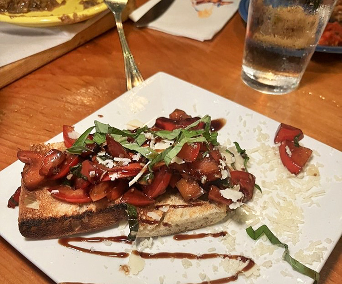 Bruschetta topped with fresh ingredients that sing harmony like a perfectly tuned barbershop quartet.