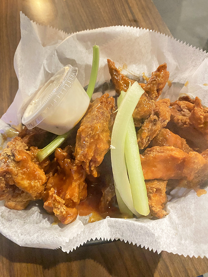 Buffalo wings that don't whisper heat&mdash;they announce it proudly with crispy edges and that unmistakable orange glow of promise.