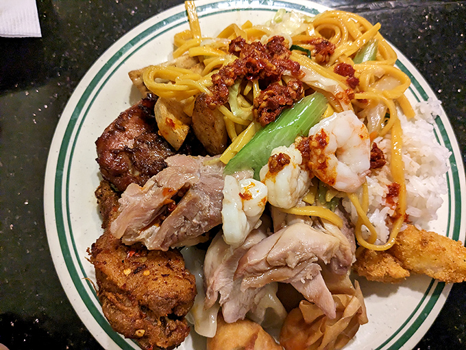 The buffet plate &ndash; a topographical map of flavor countries, where every border crossing brings new and delicious diplomatic relations.