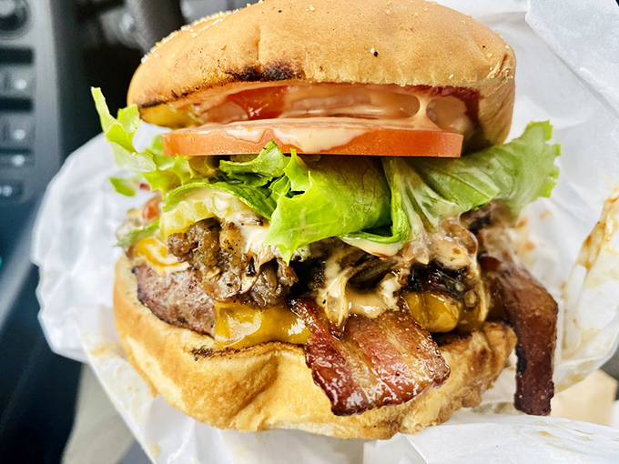 The bacon cheeseburger comes fully loaded with fresh veggies and a perfectly charred patty &ndash; proof that sometimes the classics need no improvement.