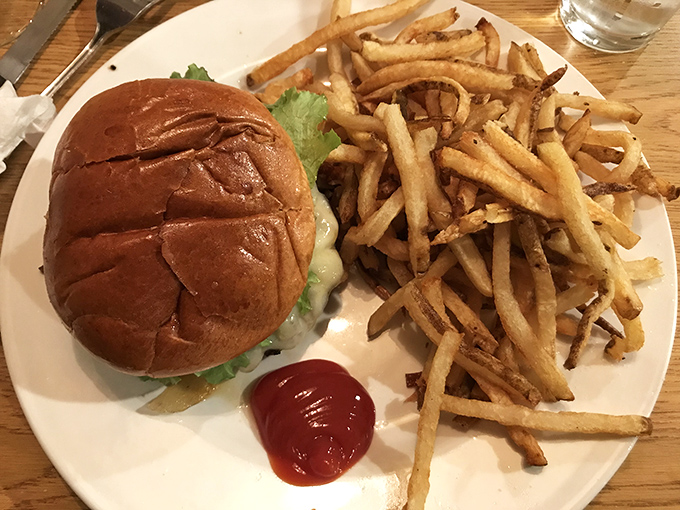 Sometimes you just need a perfectly executed burger and hand-cut fries. The ketchup dollop stands ready for its supporting role in this comfort food classic.