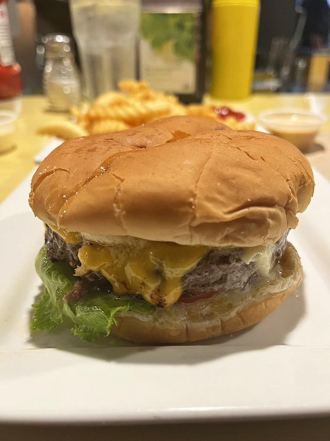 Behold the star attraction: a butter burger in all its glory, where cheese melts seductively over beef on a perfectly toasted bun.