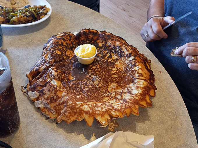 This pancake isn't just big&mdash;it's Arizona-sunset big, with edges crispy and center fluffy enough to make your pillow jealous.