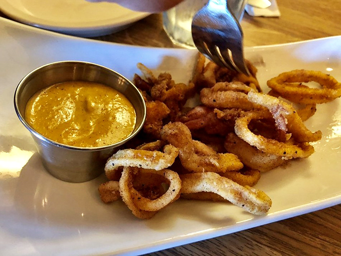 Calamari that's actually crispy, not those rubber bands masquerading as seafood at lesser establishments. The dipping sauce looks worth bottling.