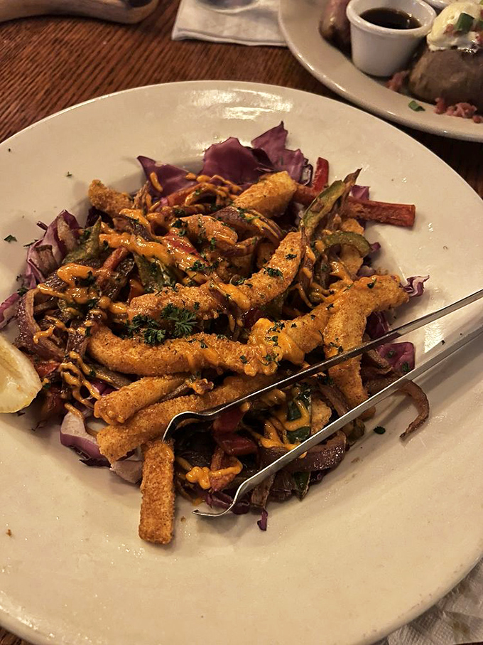 Calamari that's crispy, tender, and served on a bed of purple cabbage&mdash;like ocean jewelry displayed on royal velvet.