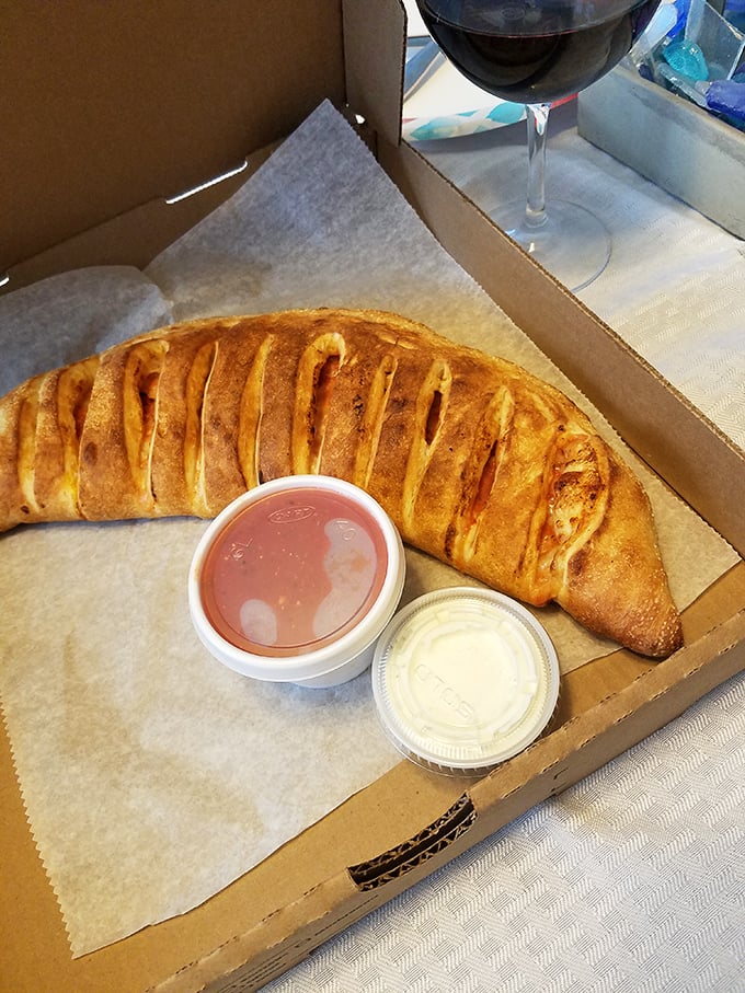 The stromboli: pizza's sophisticated cousin who studied abroad and came back with better table manners and a side of marinara.