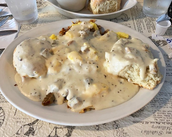 When breakfast gets the full Southern treatment&mdash;creamy gravy cascading over biscuits, with eggs and potatoes standing by for reinforcement. Morning glory on a plate.