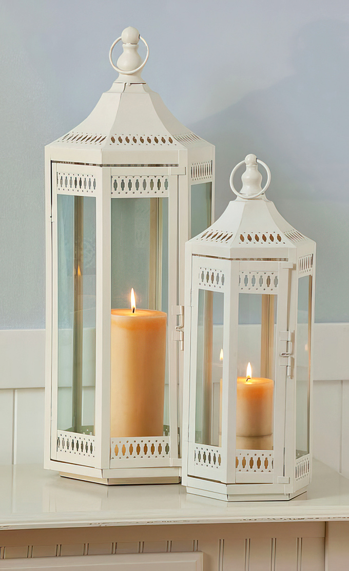 Not just lanterns, but mood-setters. These elegant white pieces could transform any patio from "meh" to magical with the strike of a match.