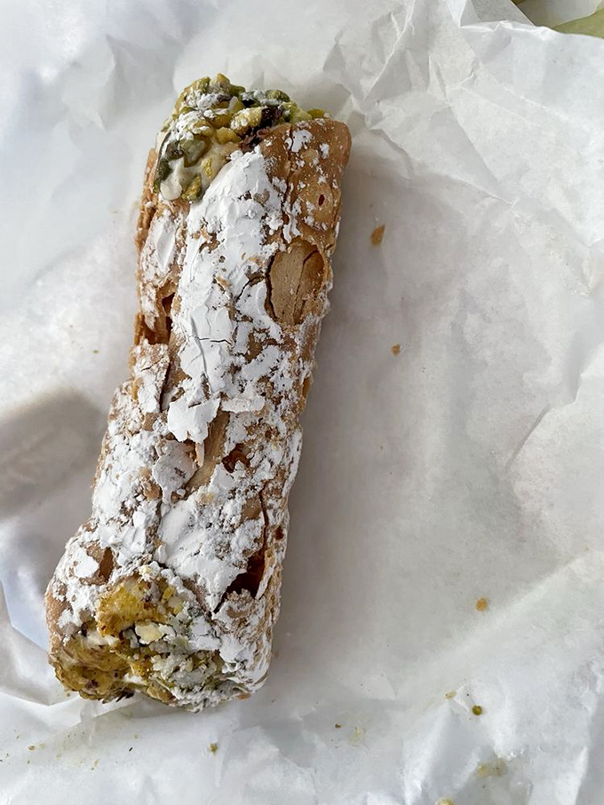 Not all heroes wear capes&mdash;some wear powdered sugar. This cannoli, with its crisp shell and sweet filling, is the perfect finale to your deli adventure.
