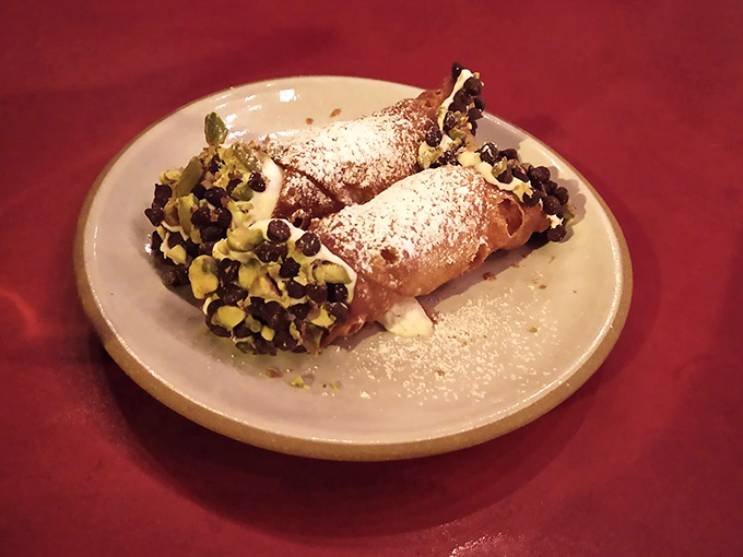 Cannoli that would make any Sicilian grandmother weep with joy &ndash; crisp shells, creamy filling, and that chocolate-pistachio finish.