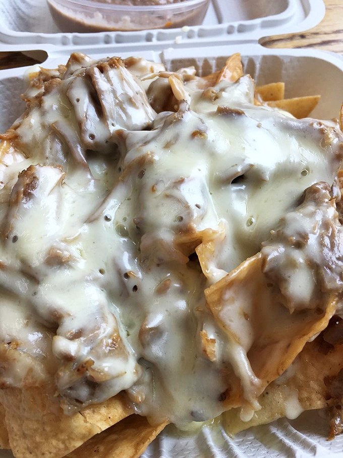 These nachos aren't playing around&mdash;they're serious contenders for the heavyweight championship of melted cheese and perfectly distributed toppings.