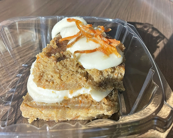 A slice of carrot cake that's worth saving room for. That cream cheese frosting could make even vegetables seem like a good idea.