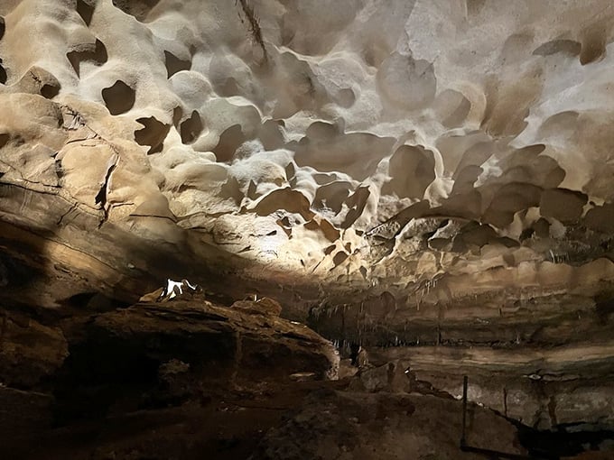 These ceiling formations look like a lunar landscape turned upside down. If the moon and Swiss cheese had a geological love child, this would be it.