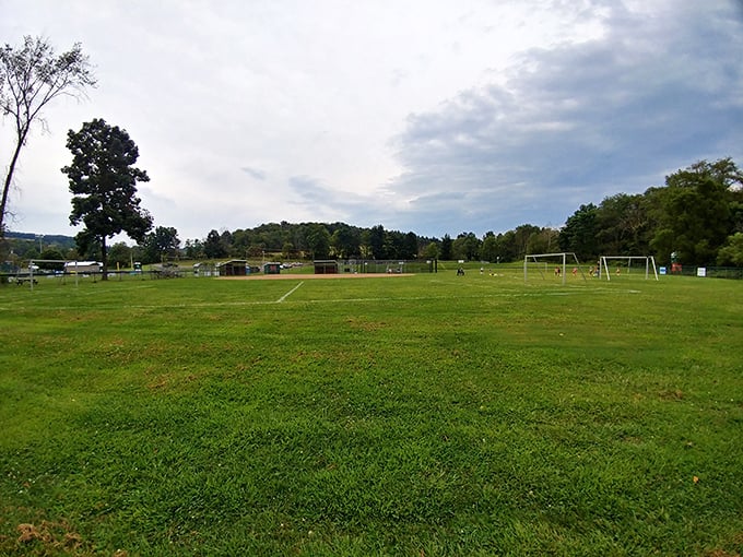 Soccer goals stand ready on this community field where weekend warriors and future World Cup hopefuls alike can chase their dreams across the well-kept grass.