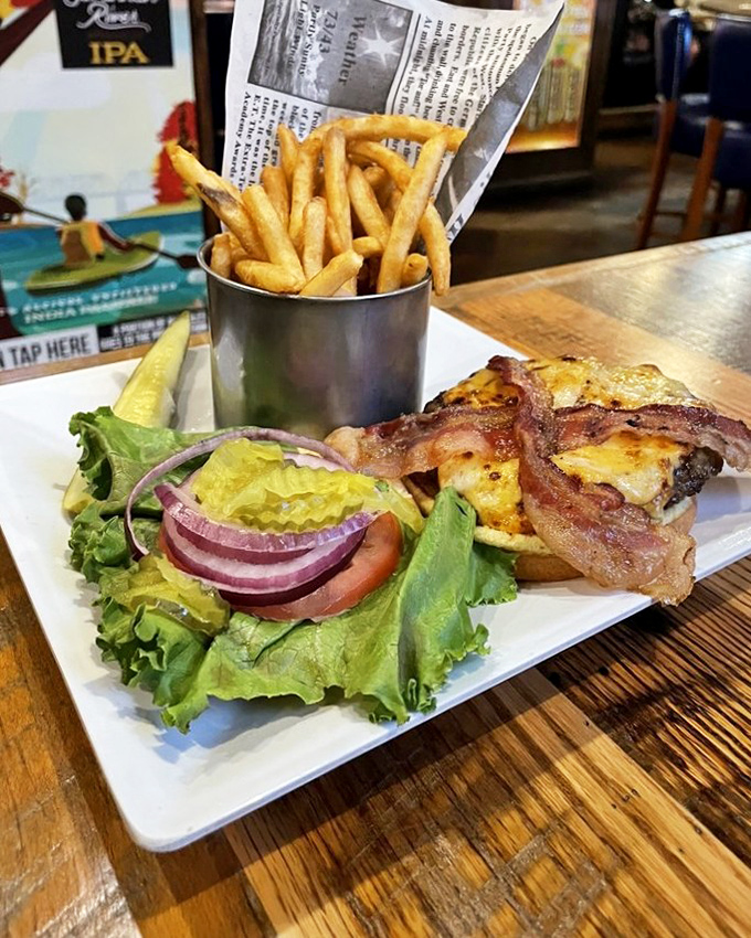 Crispy bacon, melted cheese, and a perfectly charred burger served with a side of golden fries&mdash;this is what burger dreams are made of, folks.
