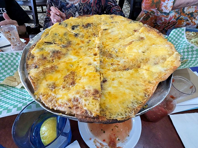 The cheese crisp: Arizona's answer to pizza, but with a southwestern swagger that makes New York slices jealous.