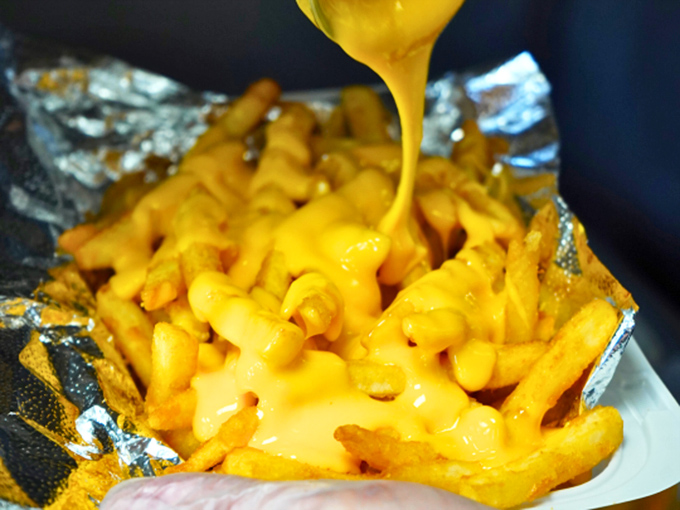Cheese fries that make you question why anyone would eat potatoes any other way. The cascading cheese is practically performing a waterfall dance.