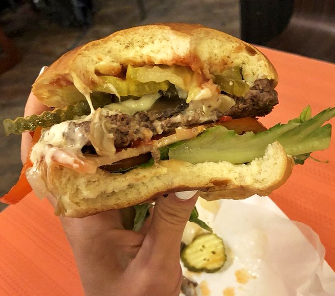 This isn't just a burger &ndash; it's a masterclass in balance. The pickle provides that perfect acidic counterpoint to the richness.